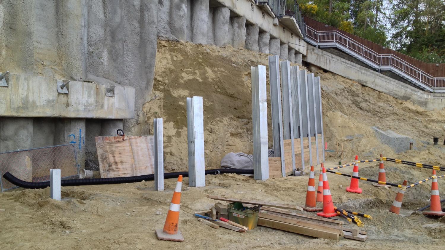 Lakefront Retaining Wall Construction Before & After Landscaping